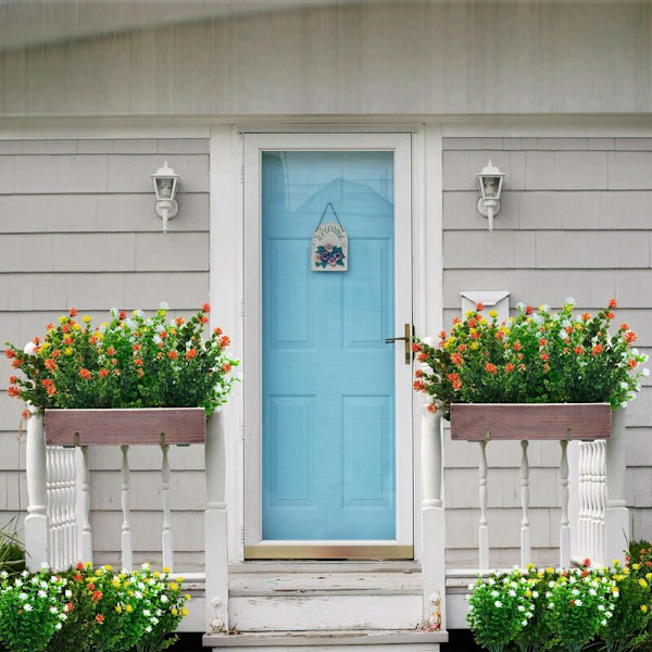 Konstgjorda blommor, vita gula orange konstgjorda blommor utomhus konstgjorda gröna buskar för ...