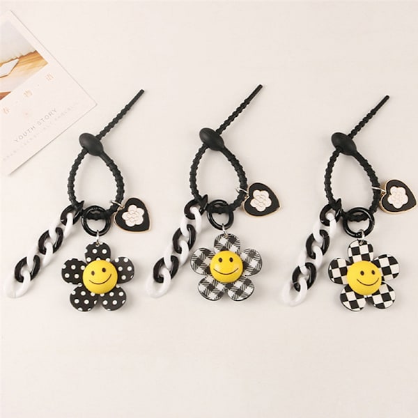 Trendig solblomma Smiley nyckelring Leende blomma nyckelring med H A2 ...